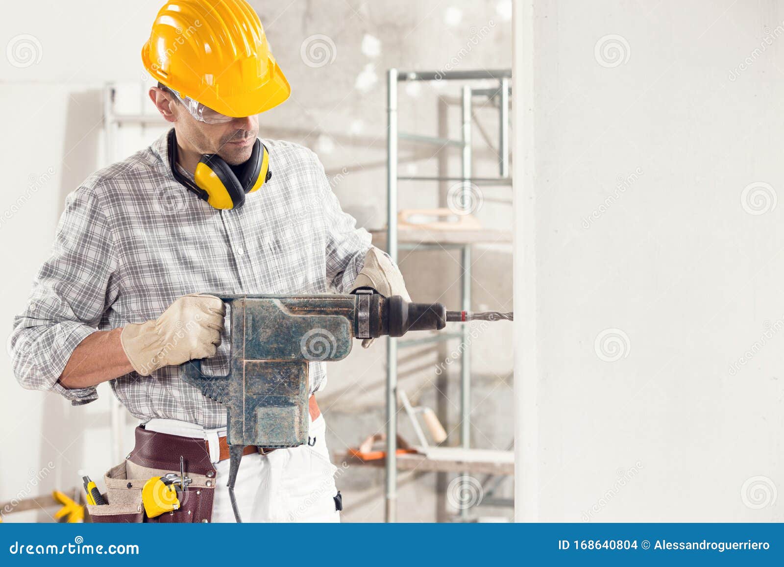 Builder Using a Handheld Power Drill Stock Photo - Image of helmet ...