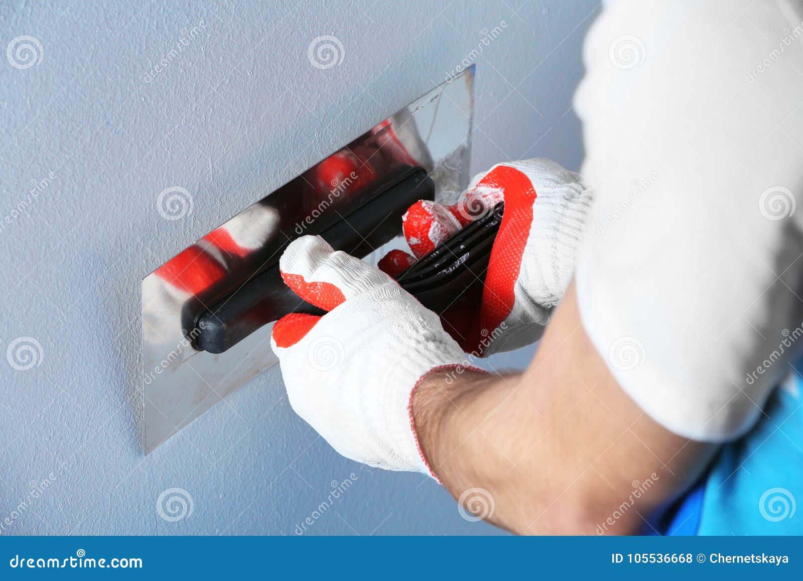 Builder Using Plastering Tool Stock Photo - Image of home, plastering ...