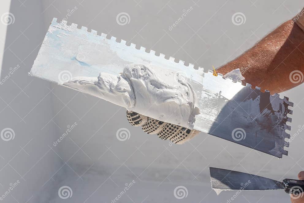 Builder Using Plastering Tool for Finishing Wall Stock Image - Image of ...