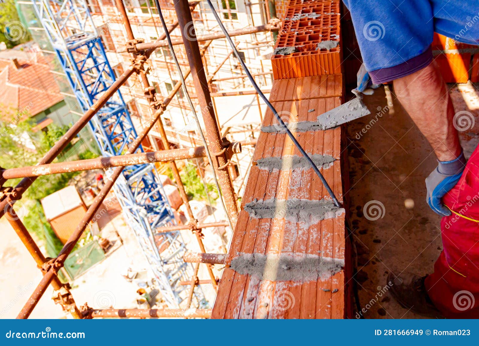 Builder Using Spatula To Remove Surplus Mortar Stock Image - Image of ...