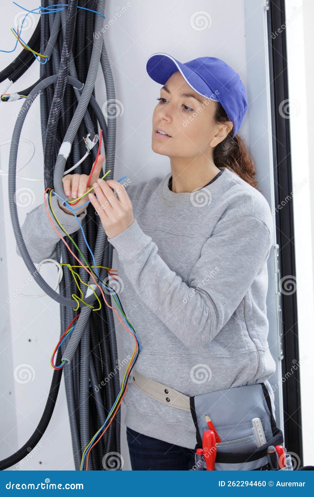 Builder Woman Working with Cables Stock Photo - Image of tool ...