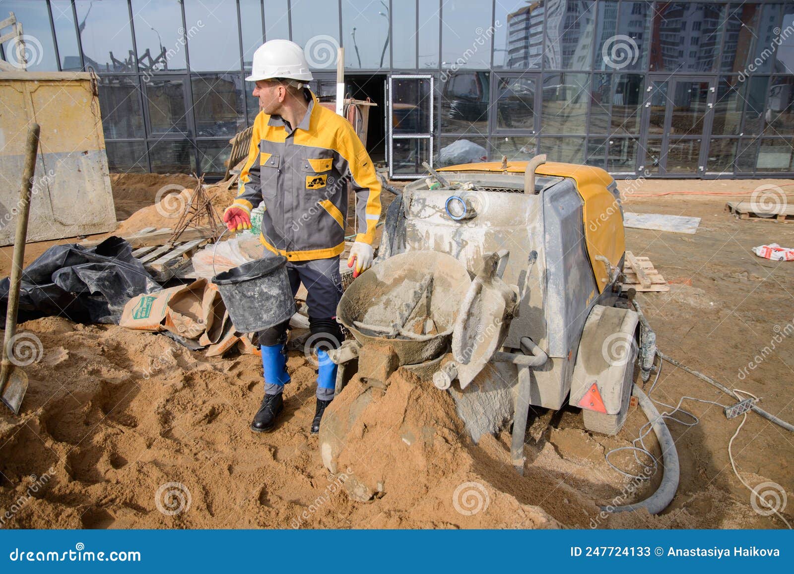 Builder in Work Clothes Prepares Tools and Materials Stock Image ...