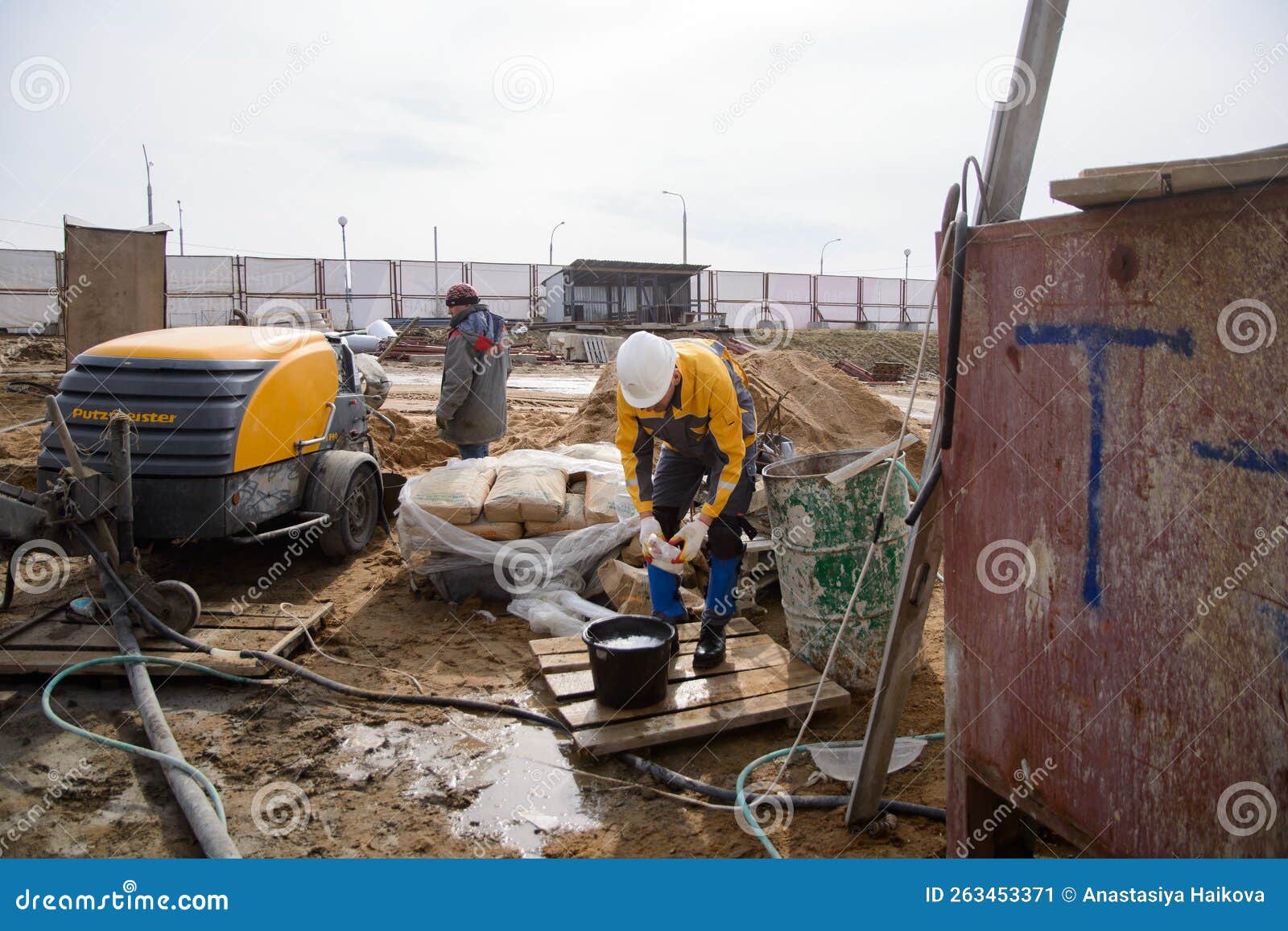 Builder in Work Clothes Prepares Tools and Materials Editorial Photo ...