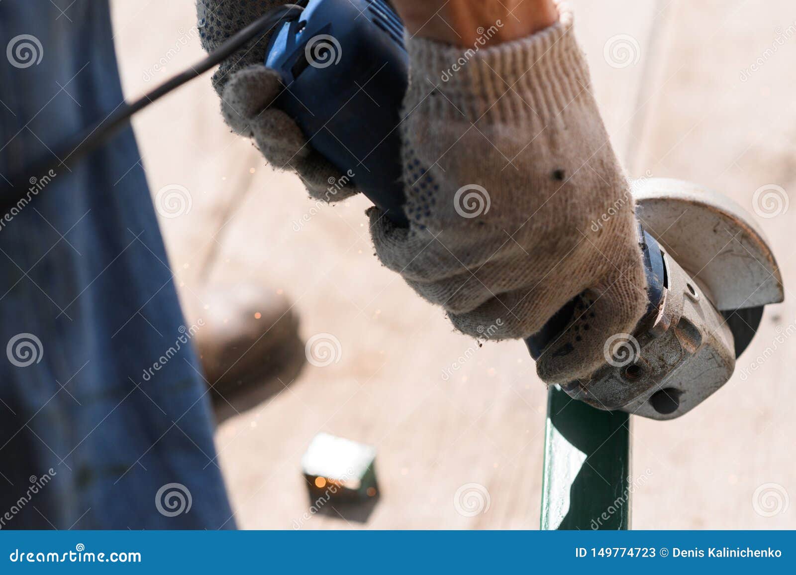 Builder Worker with Grinder Machine Cutting Metal Wood at Construction ...