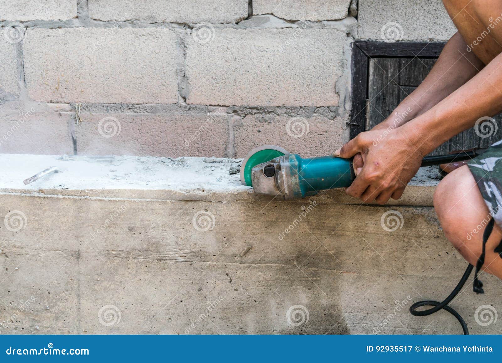 Builder Worker with Grinder Machine Cutting Finishing Concrete W Stock ...