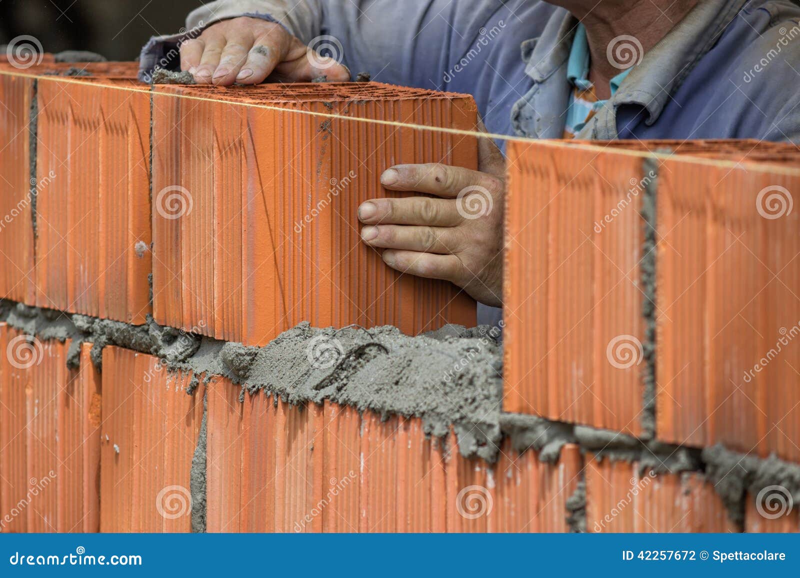 Builder Worker Installing Clay Block Wall, Lay Clay Block Stock Photo ...