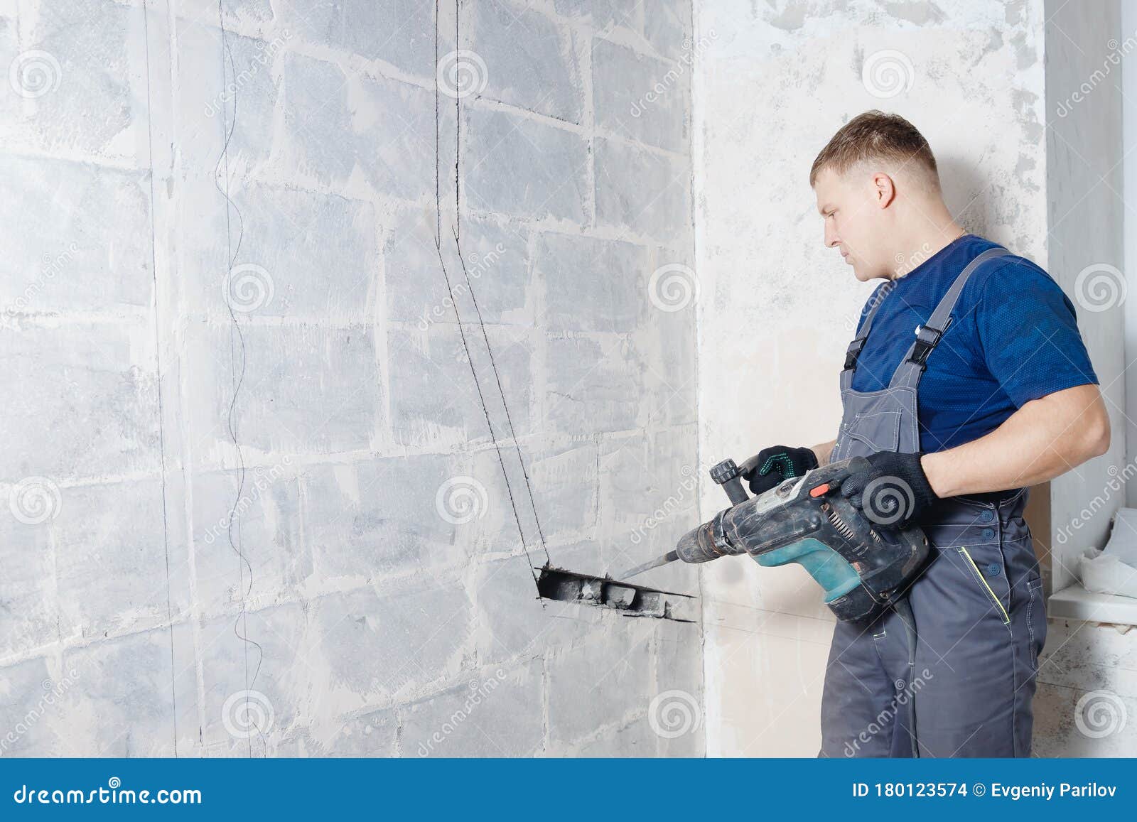 Builder Worker Man with Hammer Drill Perforator Equipment Making Hole ...