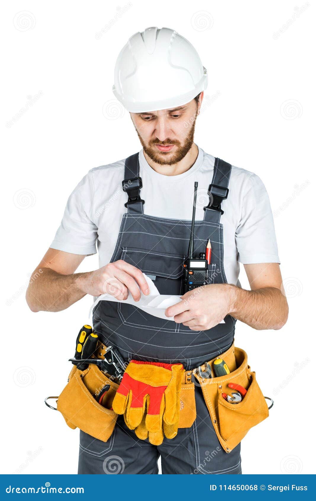 A Builder or Worker in a Protective Helmet Breaks the Contract T Stock ...