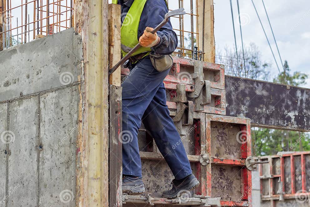 Builder Worker Removing Formwork Elements with Crowbar Stock Image ...