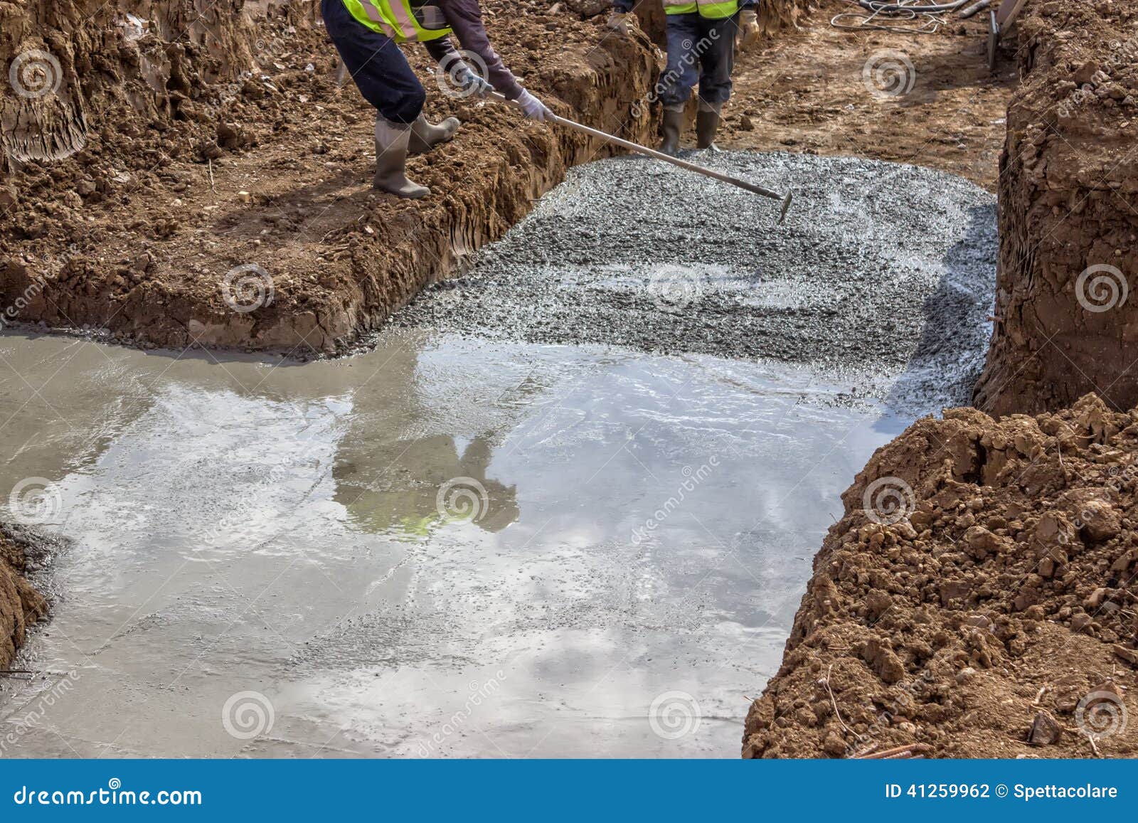 Builder Worker Using a Metal Rake To Flat Concrete Stock Photo - Image ...