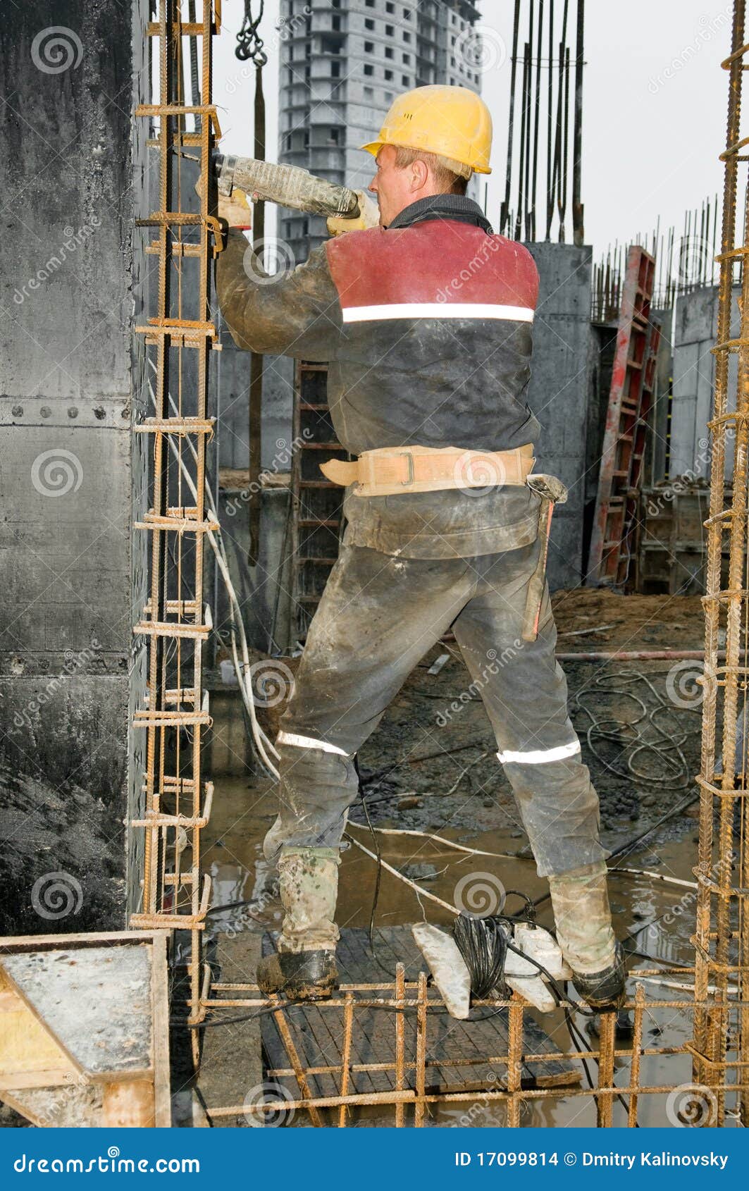 Builder working with drill stock photo. Image of falsework - 17099814