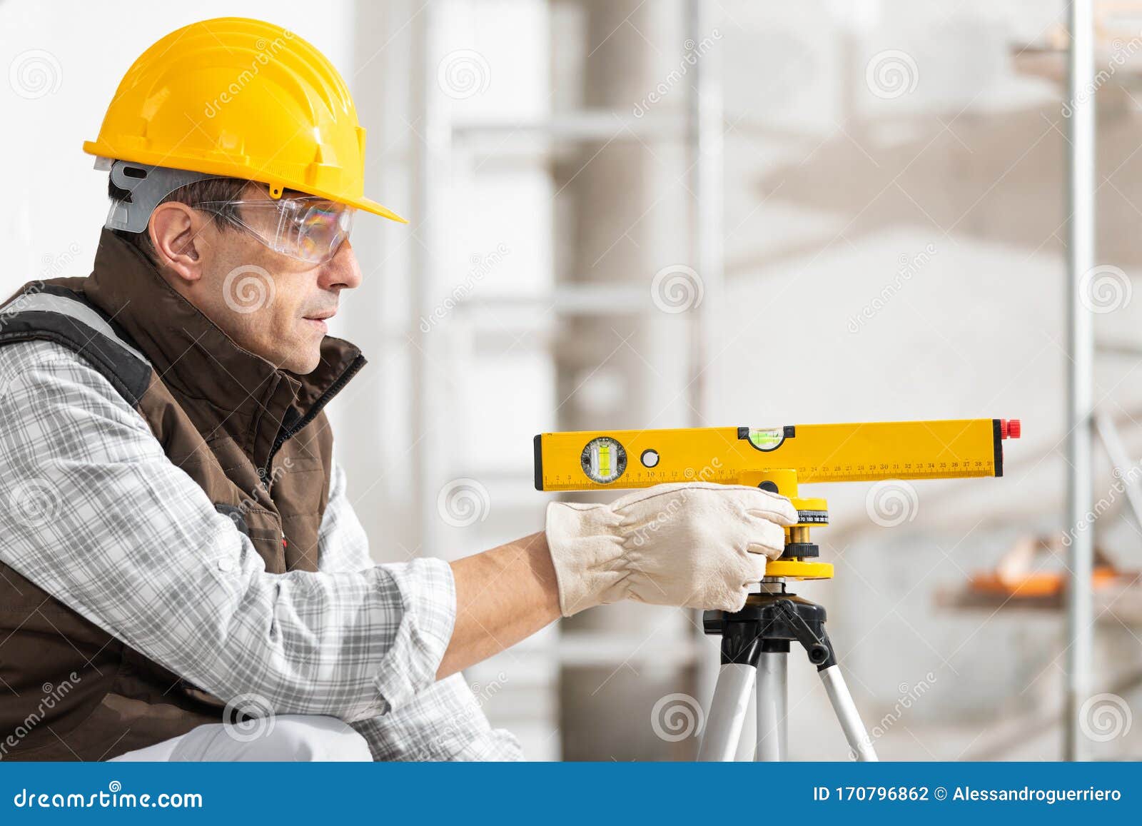 Builder or Workman Adjusting a Spirit Level Stock Photo - Image of ...