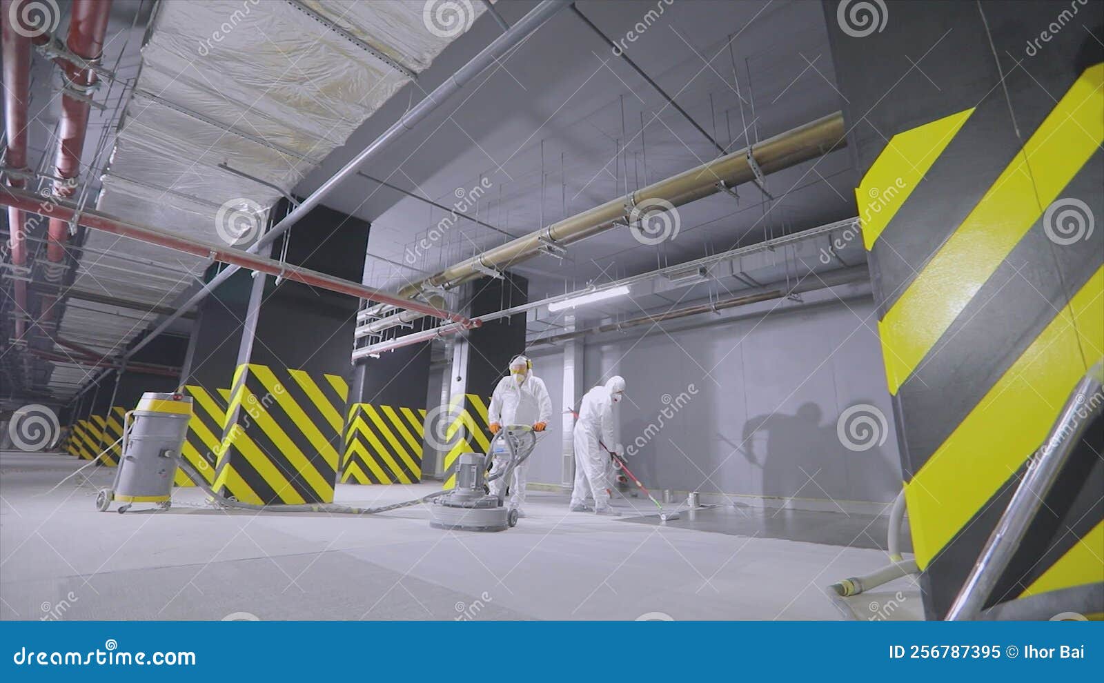 Builder Works Concrete Floor with Special Equipment. Concrete Floor ...