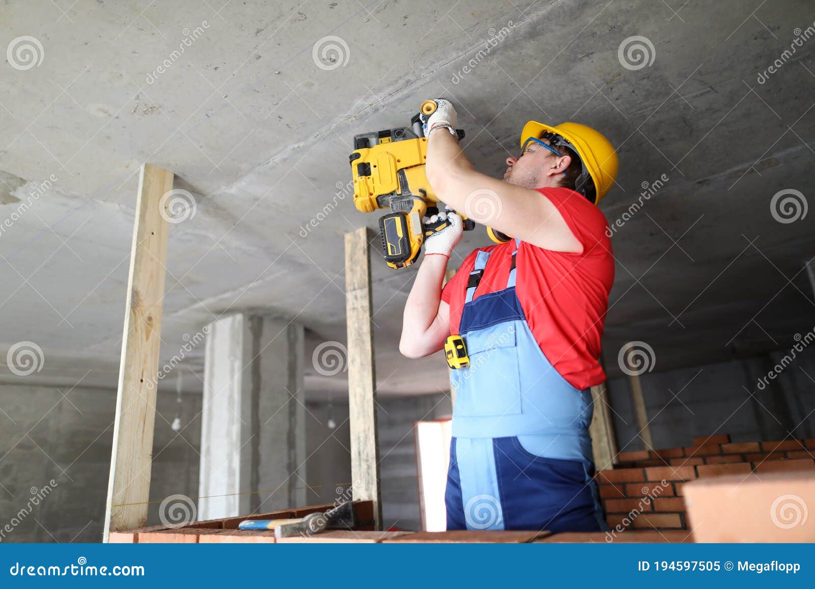 Builder Works with Special Equipment on Ceiling Stock Image - Image of ...