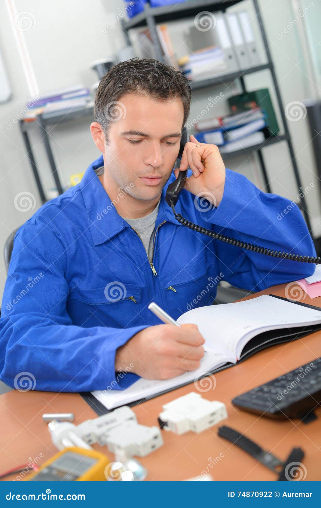 Builder writing in agenda stock photo. Image of corporate - 74870922