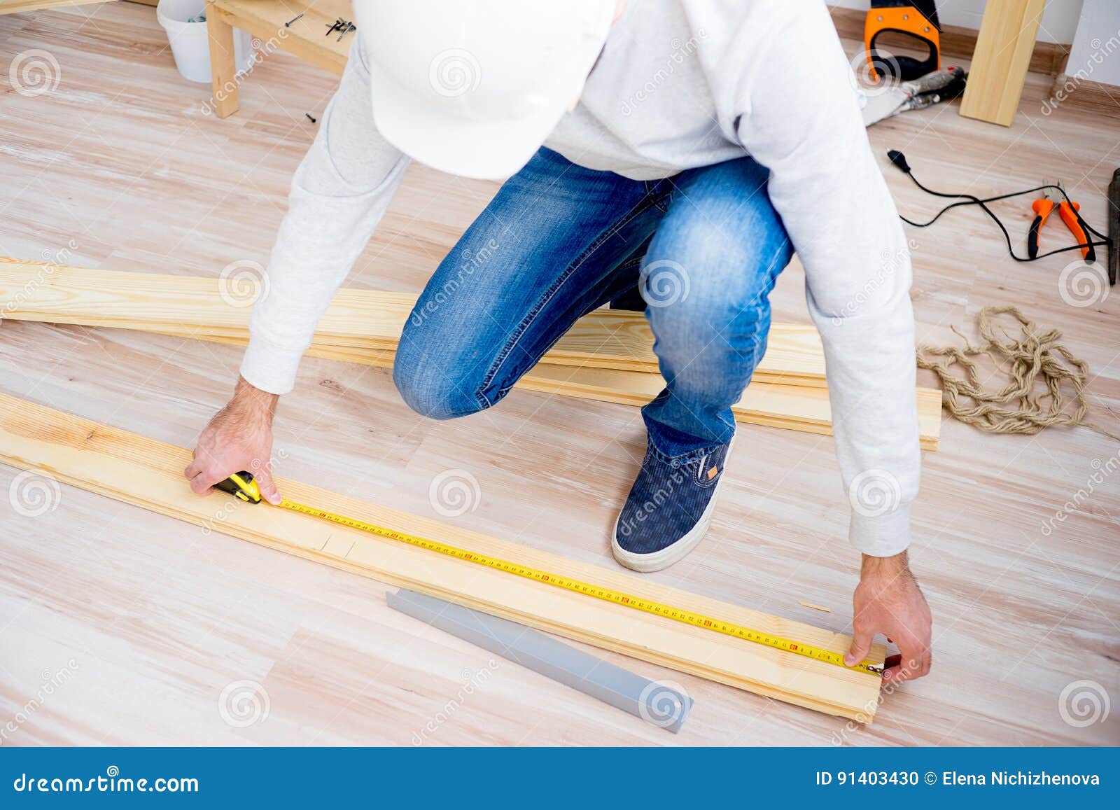 Builder with Yellow Tape Measure Stock Photo - Image of person ...