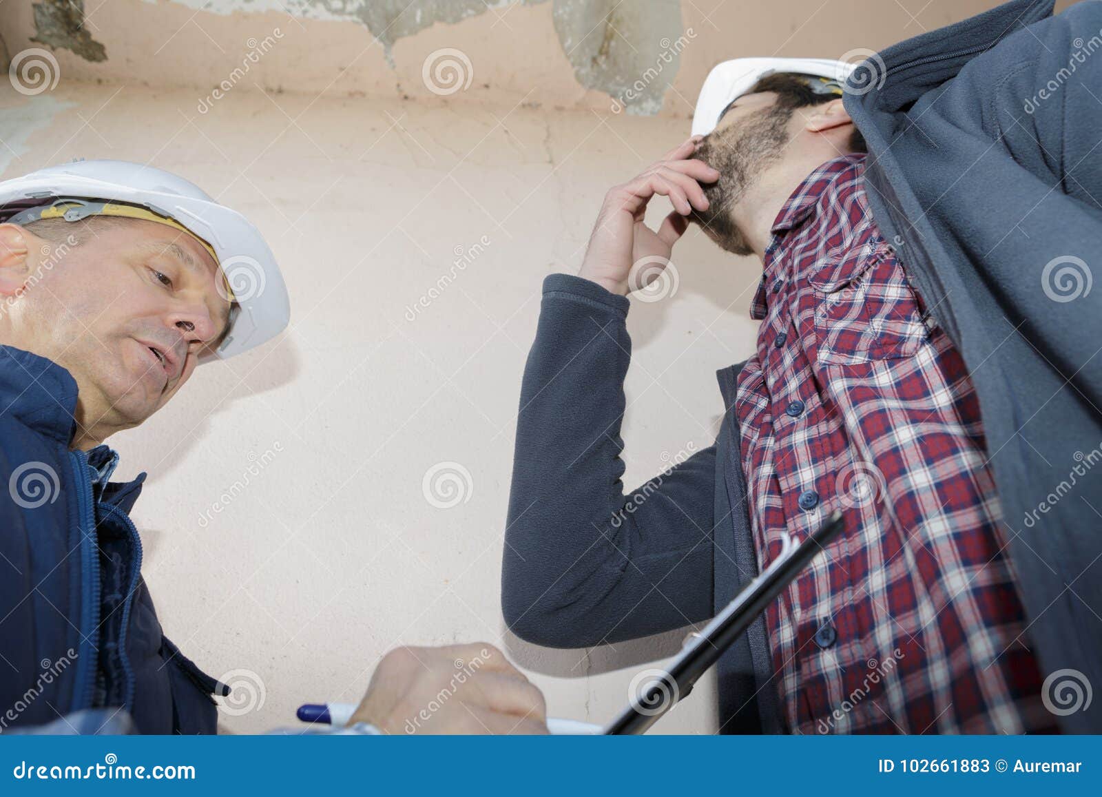 Builders Checking Leak Problem on Roof Stock Image - Image of housing ...