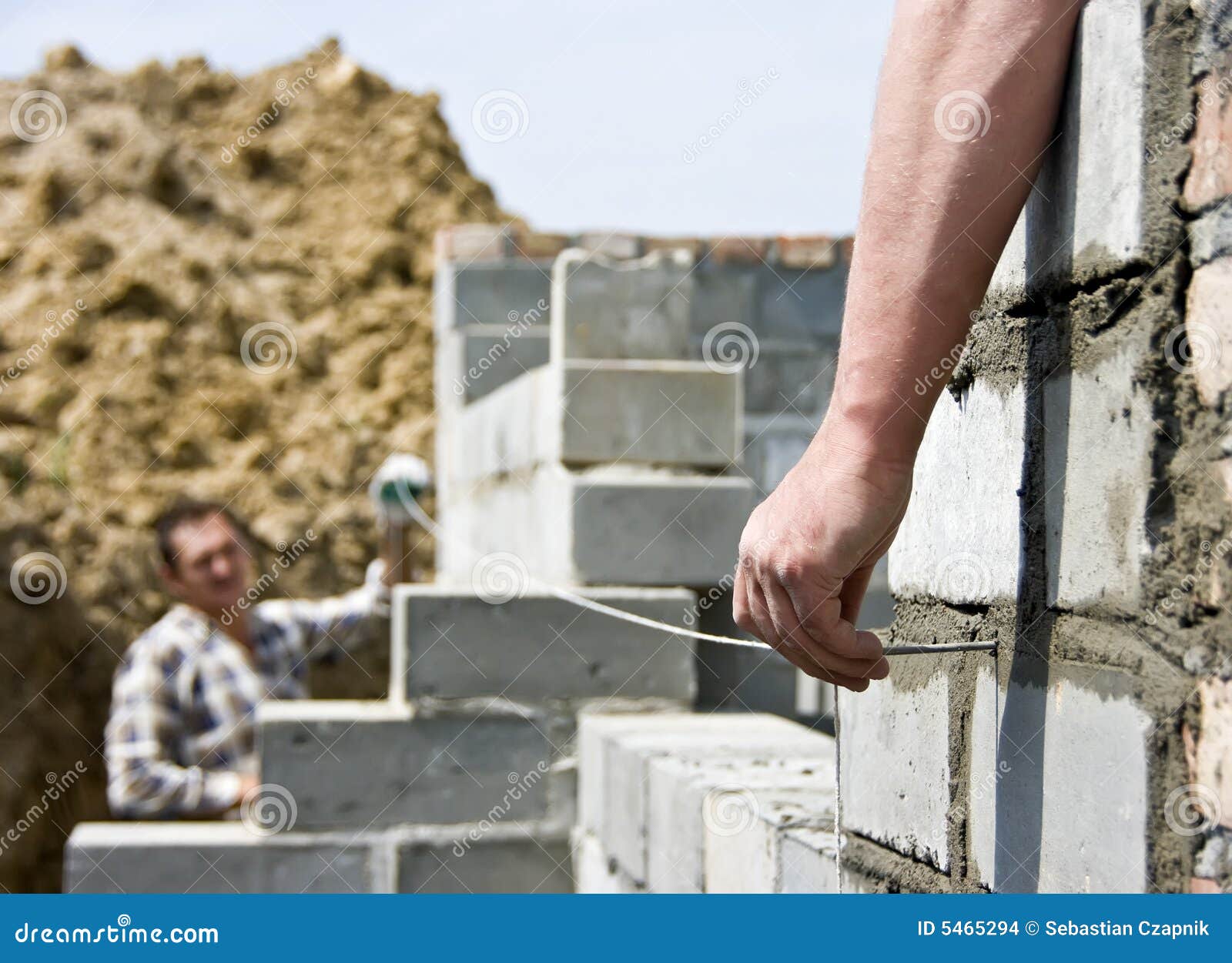 Builders checking level stock photo. Image of building - 5465294