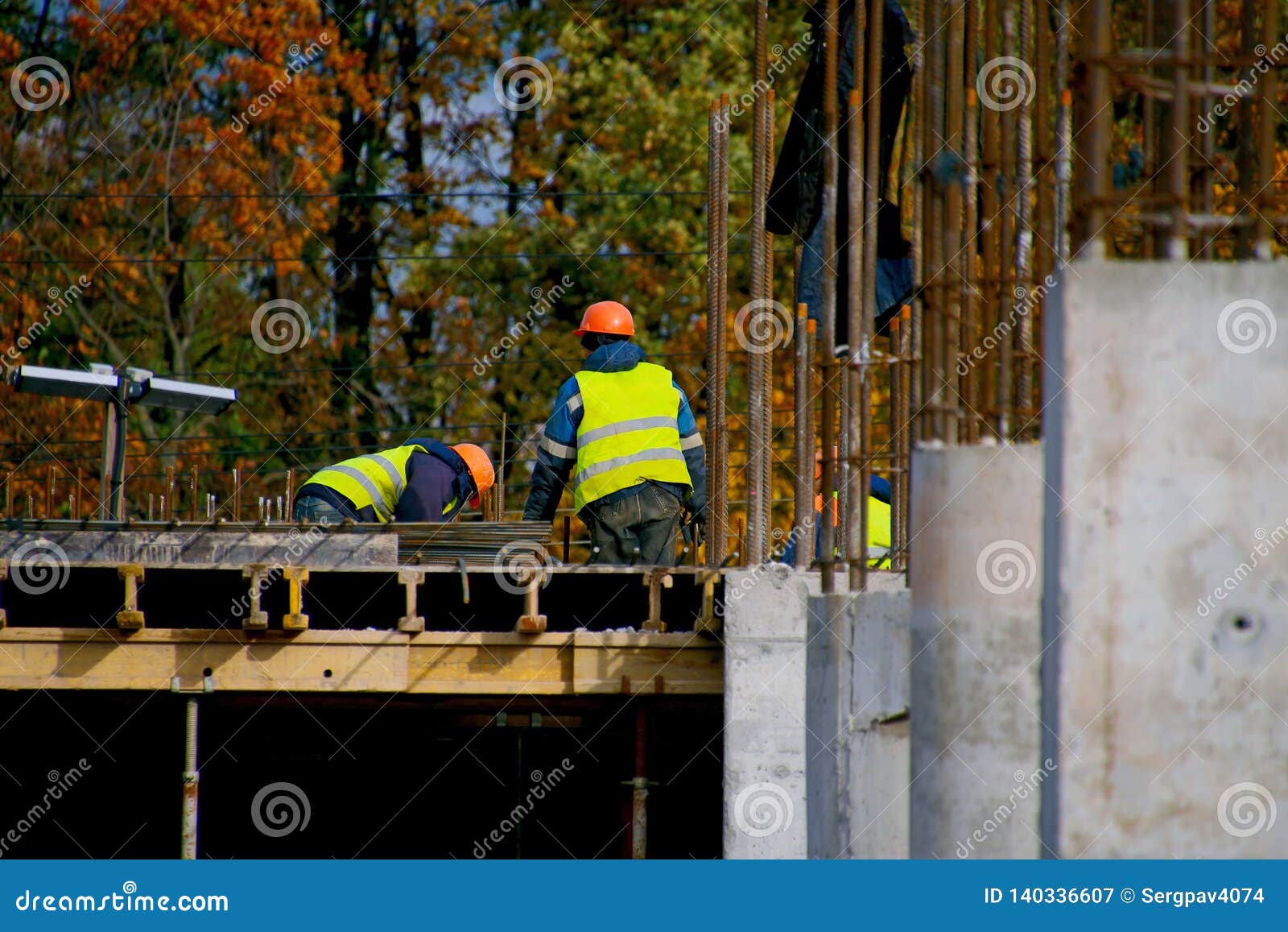 Builders at the Construction Site Stock Image - Image of orange ...