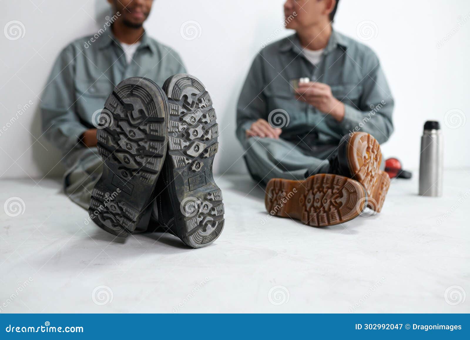 Builders Eating Lunch at Construction Site Stock Image - Image of male ...