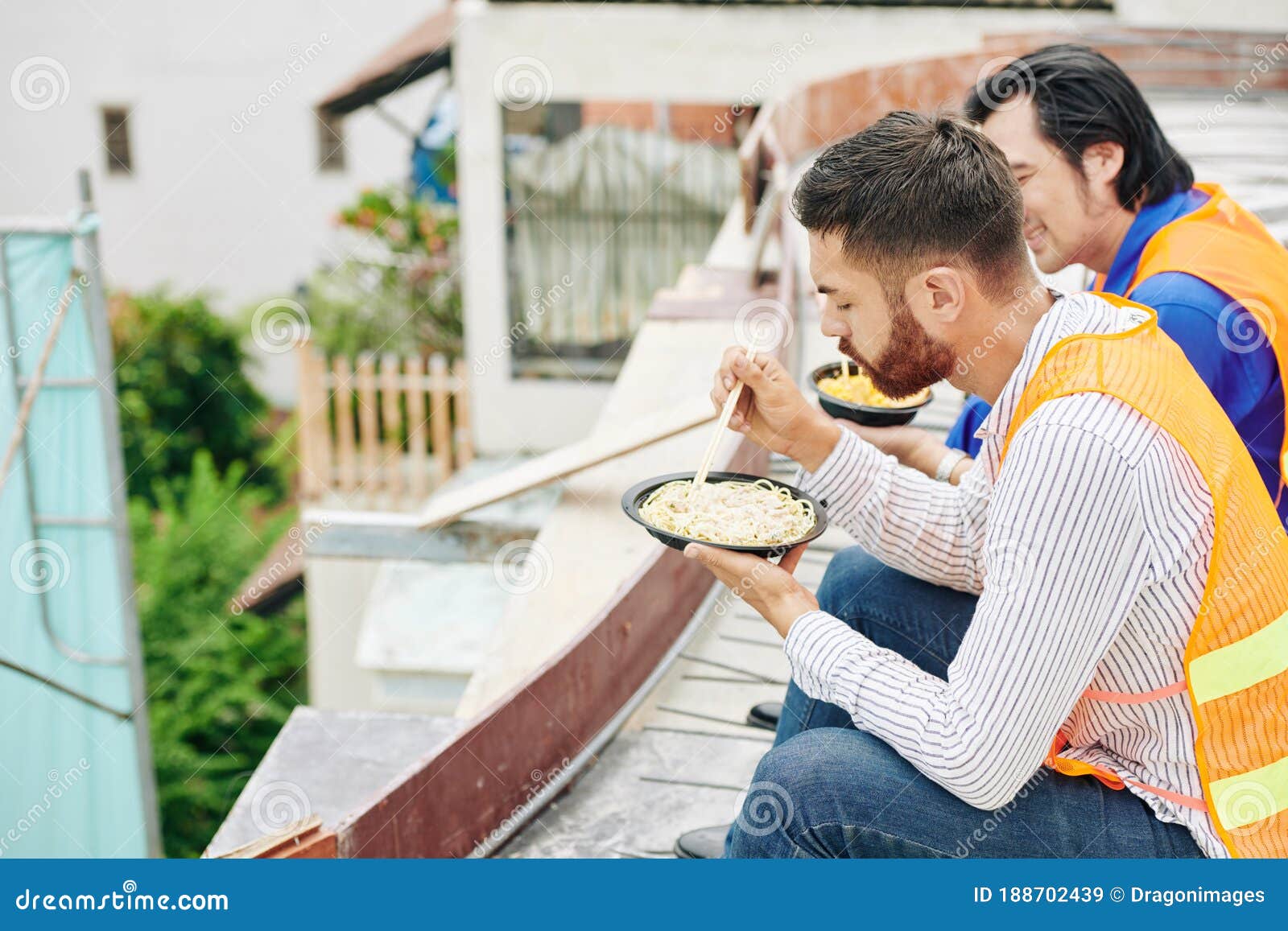 Builders eating lunch stock image. Image of builder - 188702439
