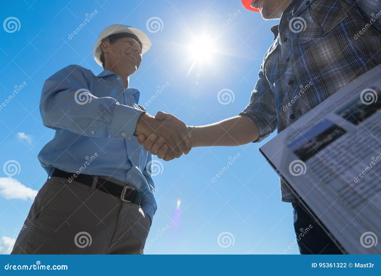 Builders Handshake, Architect and Contractor Agreement during Meeting ...