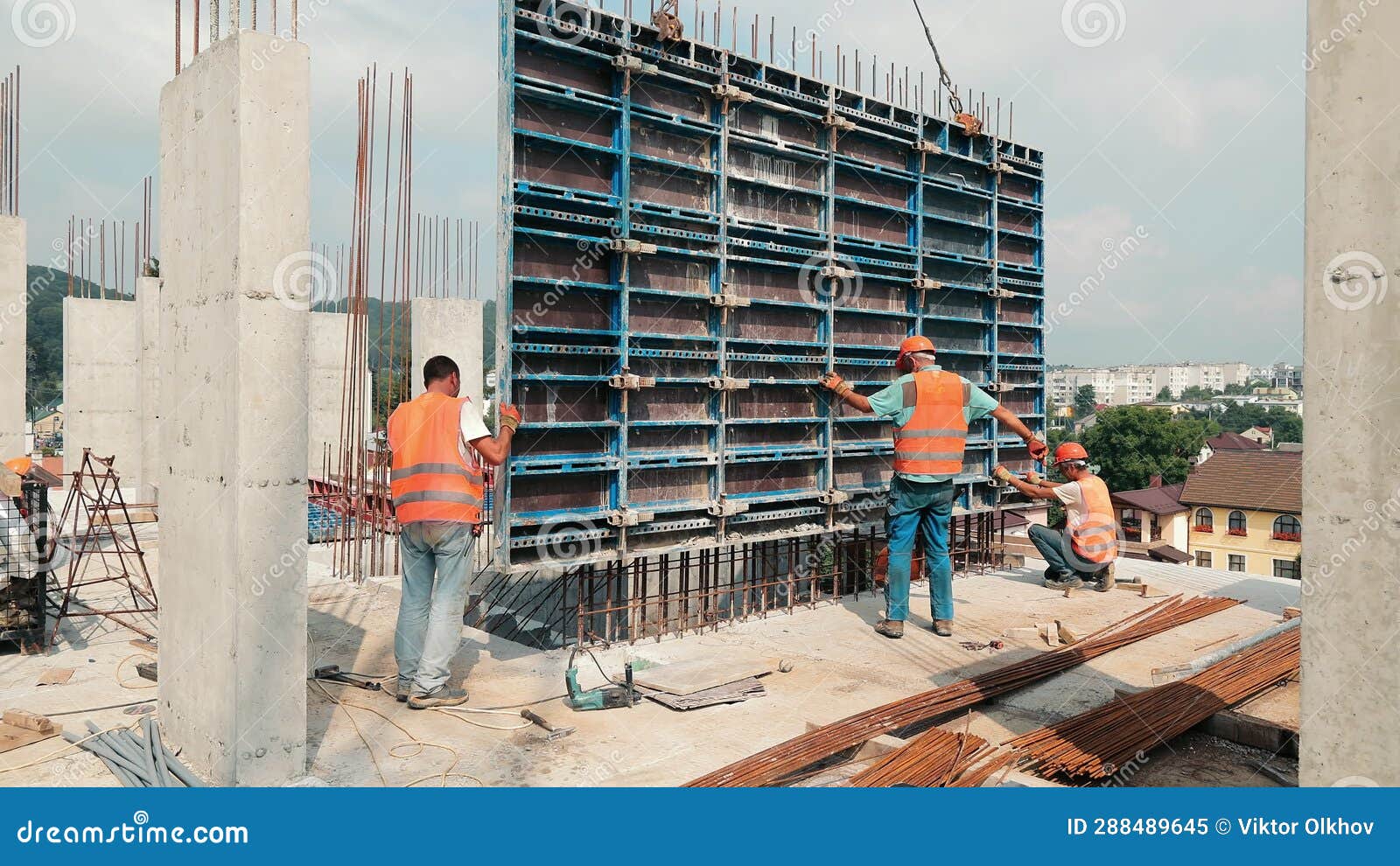 Builders Install a Large Metal Structure for Pouring Monolith ...