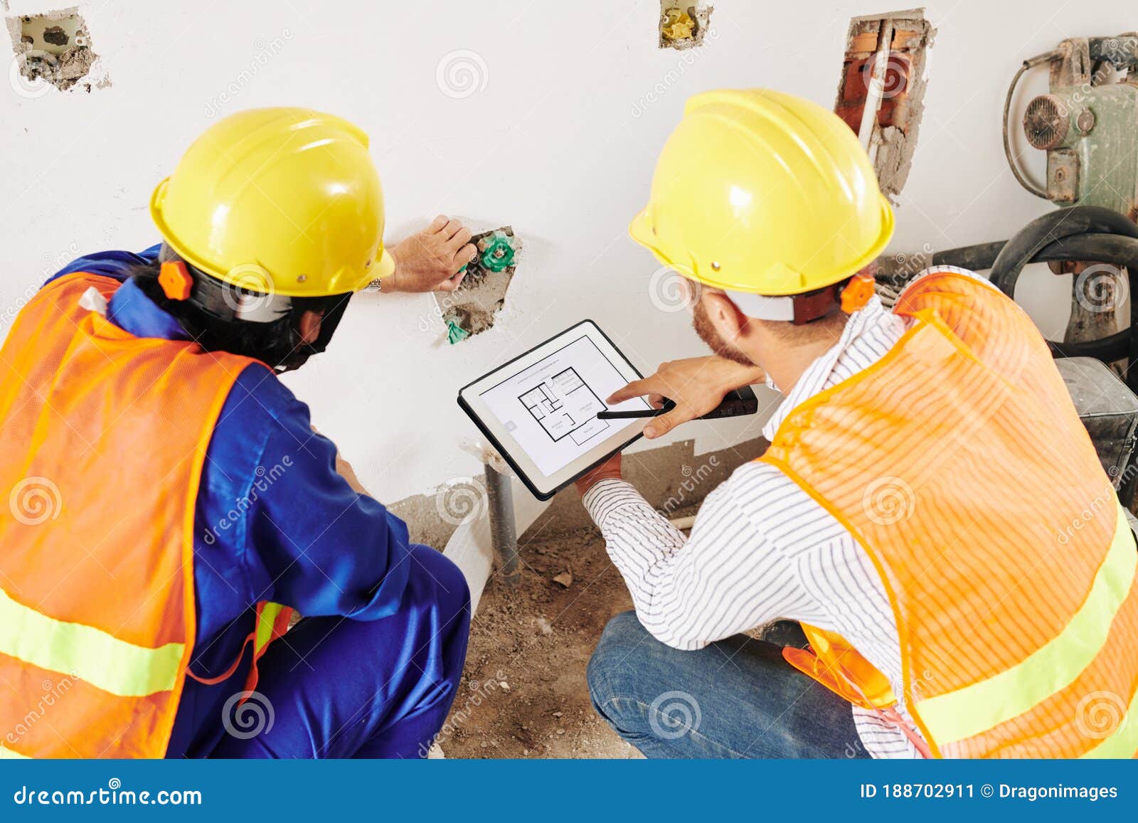 Builders installing pipes stock image. Image of equipment - 188702911