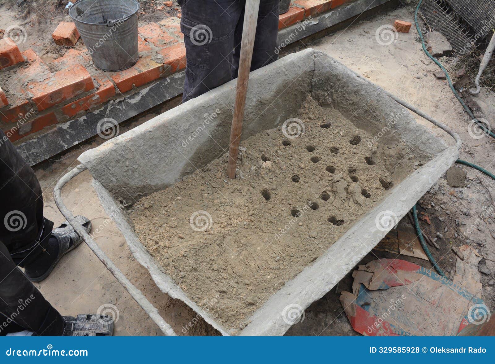 Builders Making Construction Concrete Mixing Sand and Cement Stock ...