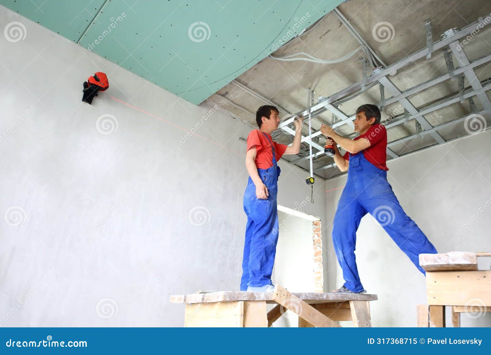 The Builders Set the Ceiling Profile in the New Stock Image - Image of ...