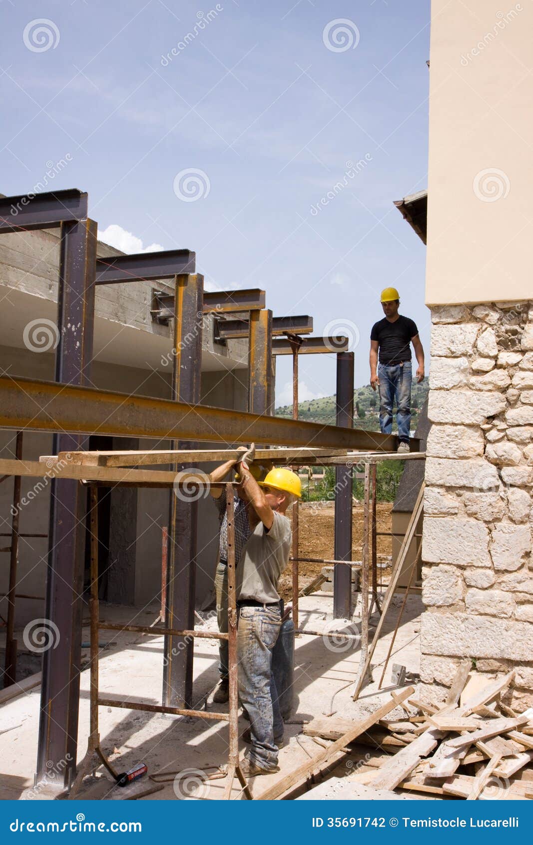 Builders at work stock photo. Image of construction, manual - 35691742