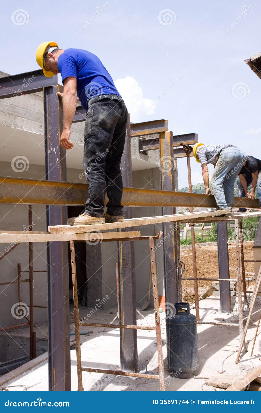 Builders at work stock photo. Image of builders, architecture - 35691744