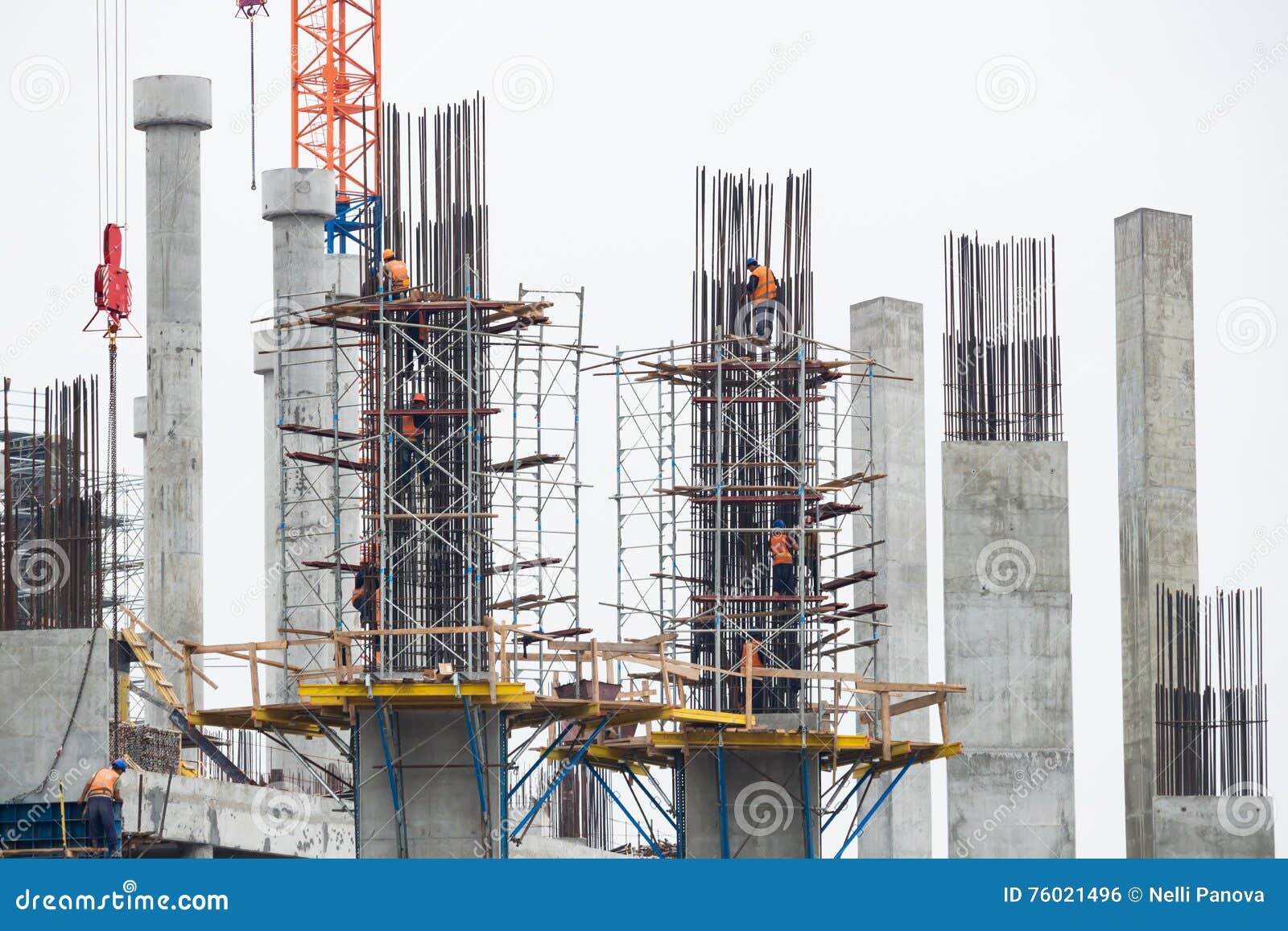 Builders Working on the Construction of a Large Building Stock Photo ...