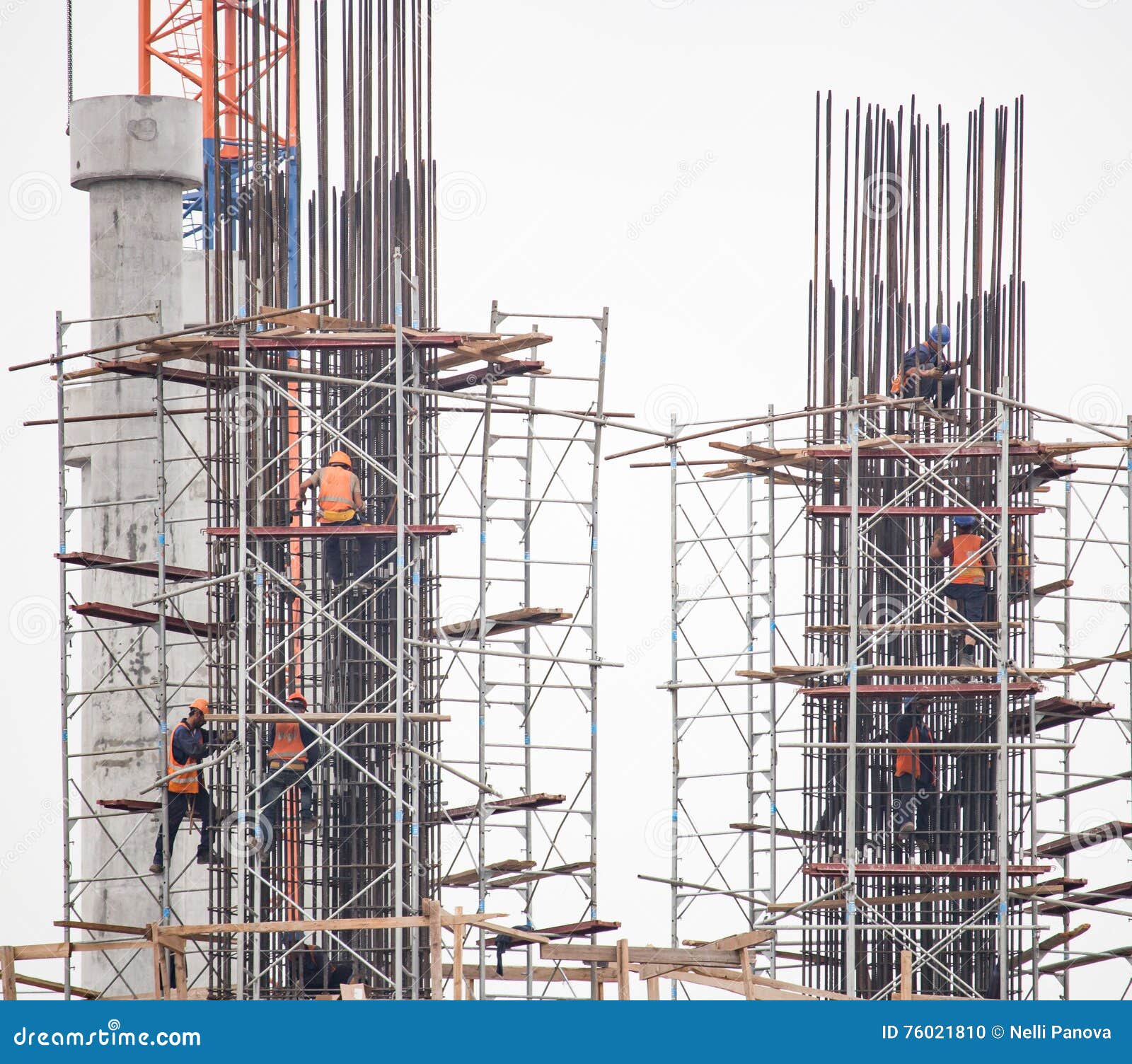 Builders Working on the Construction of a Large Building Stock Photo ...