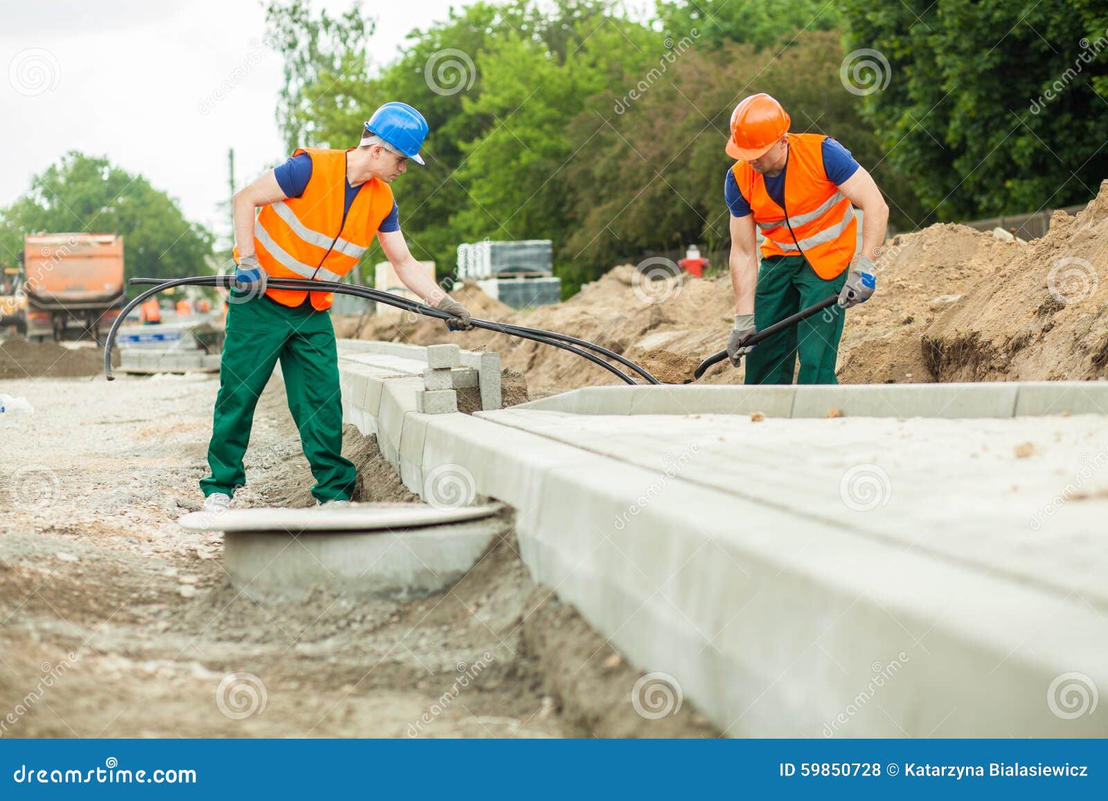 Builders working together stock photo. Image of manual - 59850728