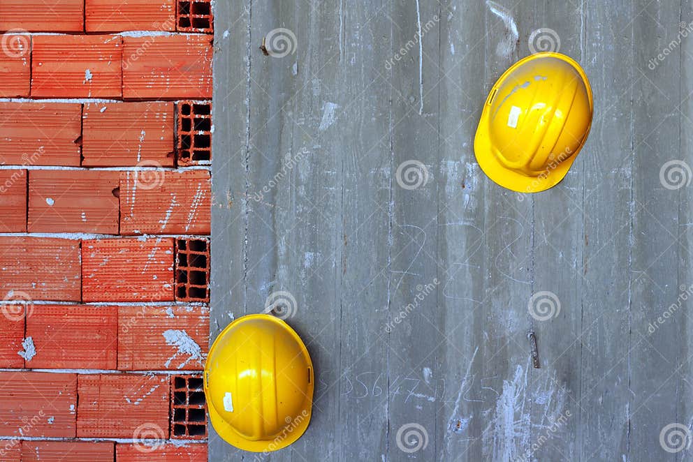 Builders yellow hard hats stock photo. Image of builder - 17525246