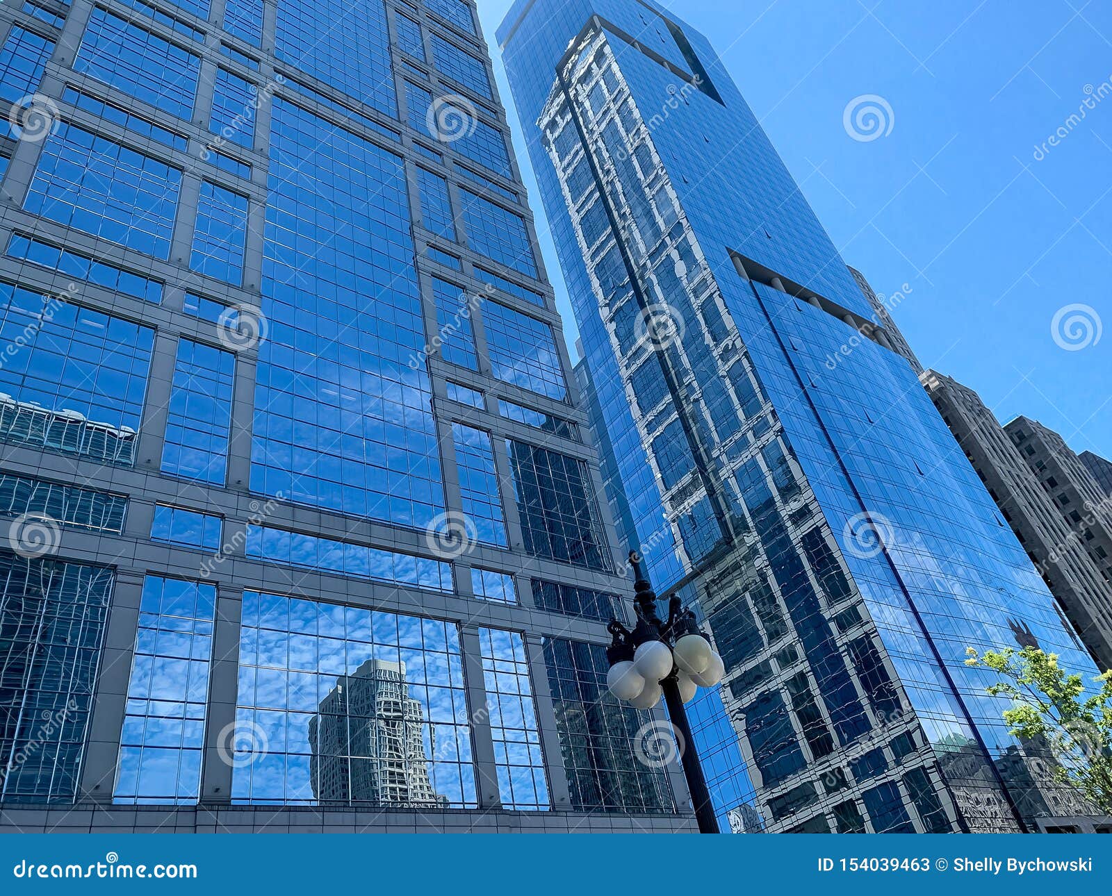 Building Architecture Reflected into Mirrored Modern Building Exteriors ...