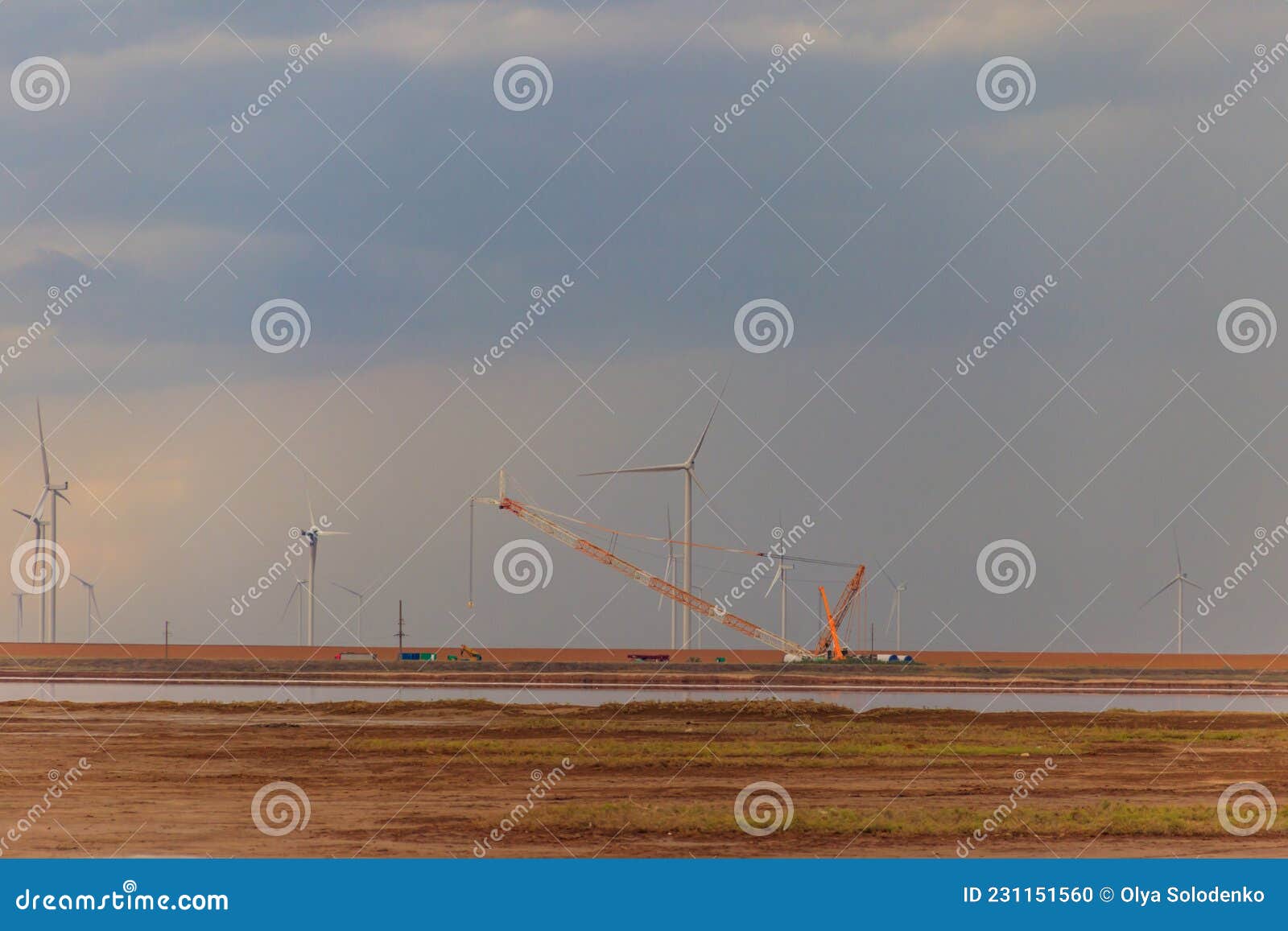 Building and Assembling Construction Wind Turbines Farm by a Crane ...