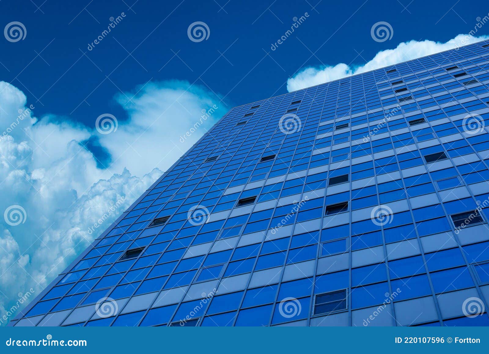 Building on the Background of Clouds Stock Photo - Image of tower, wall ...