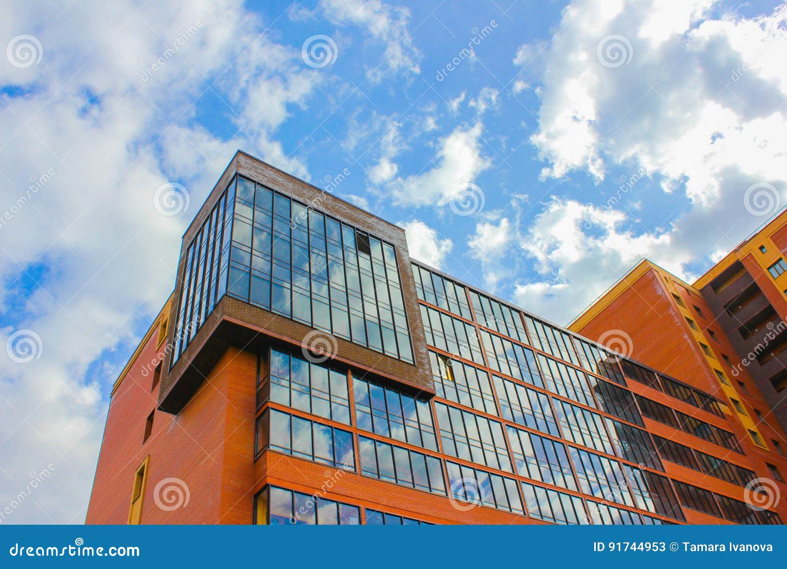 Building On Background Sky With Clouds. Against The Sky A New H Stock ...