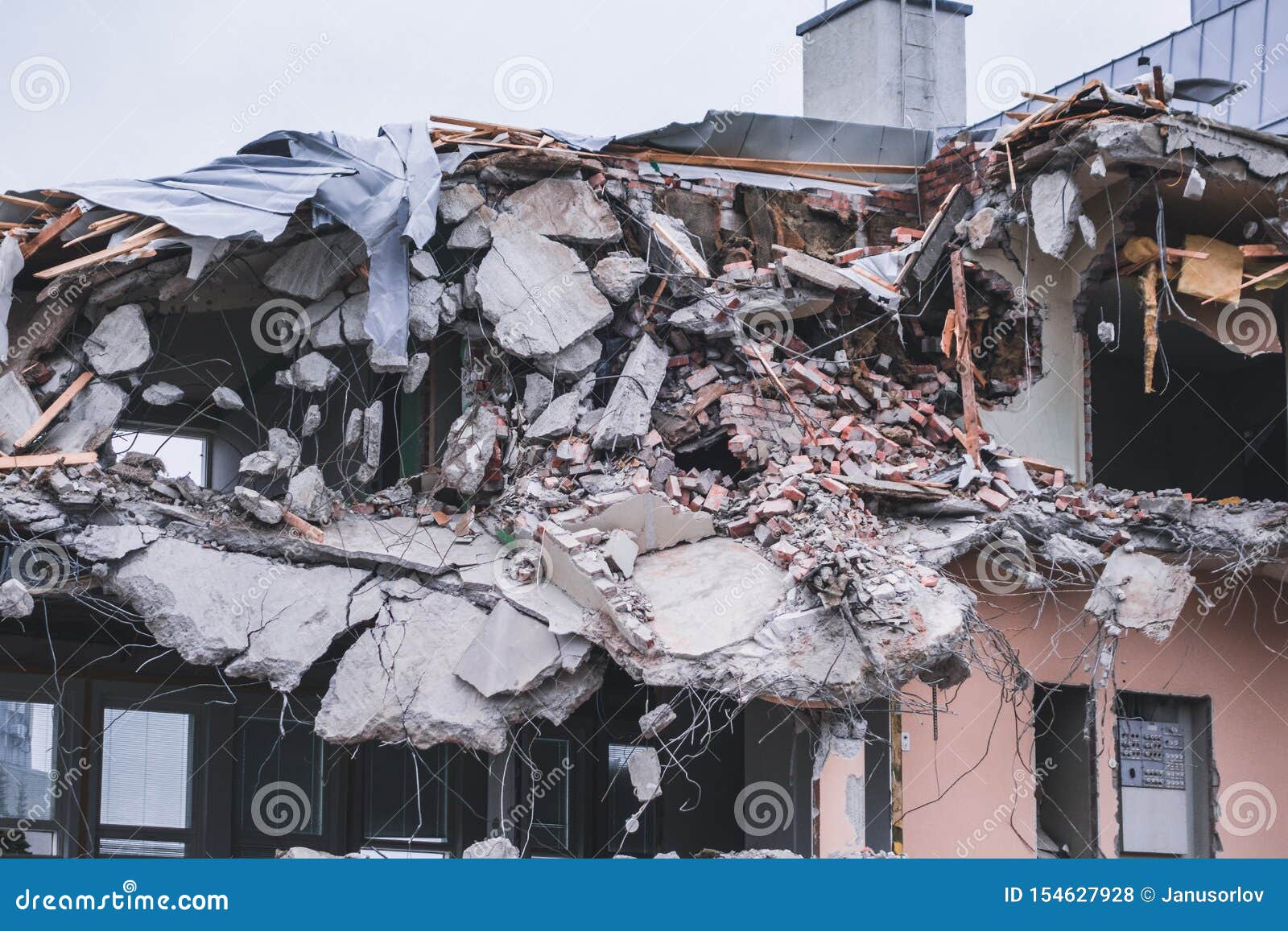 Building Been Torn Down by the Demolition Team on a Spring Day Stock ...