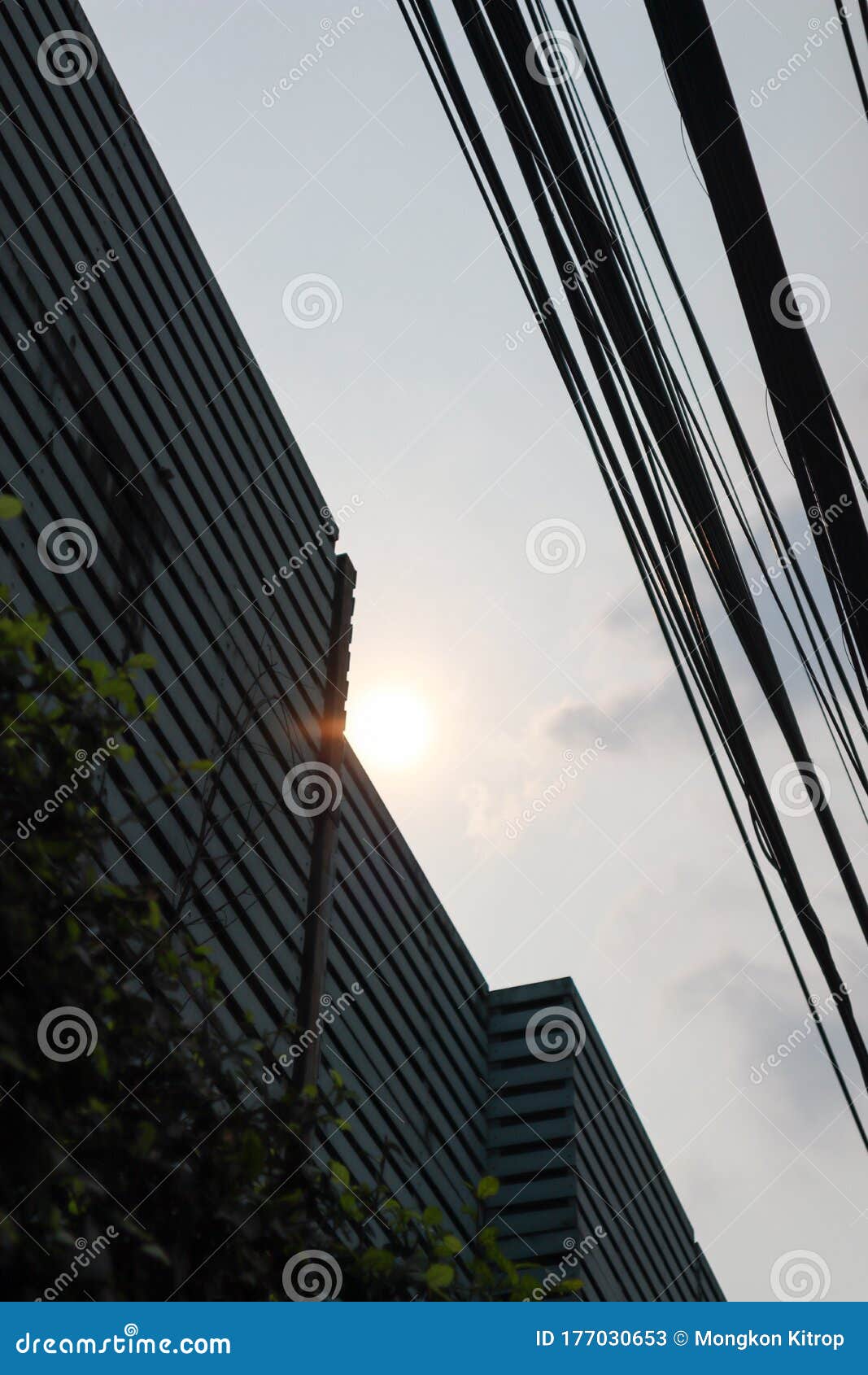 Building beside the Building, the Back Side is a View of the Sun. Stock ...