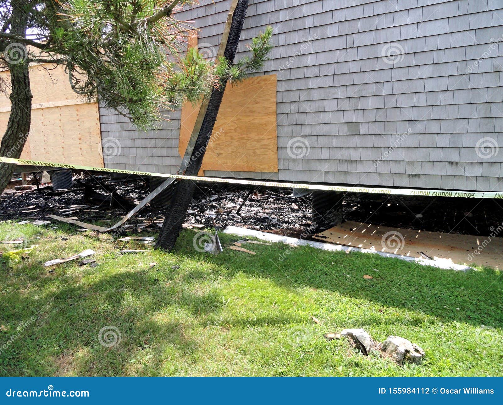 Building caught on fire. stock photo. Image of injury - 155984112