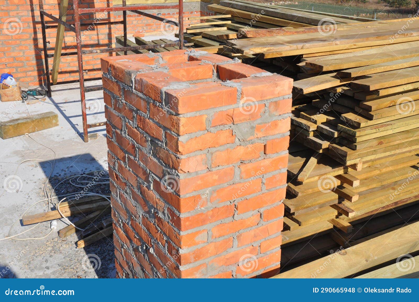 Building Chimney from Red Bricks in Unfinished House Construction Site ...