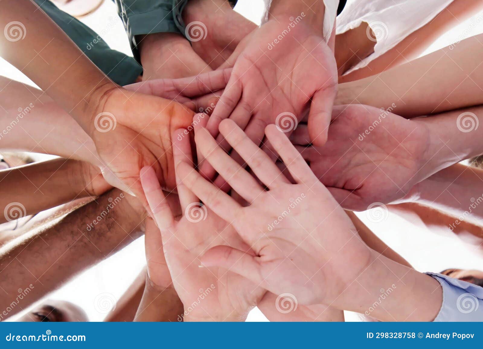 Building Cohesion: People Join Hands in Team Spirit Stock Photo - Image ...
