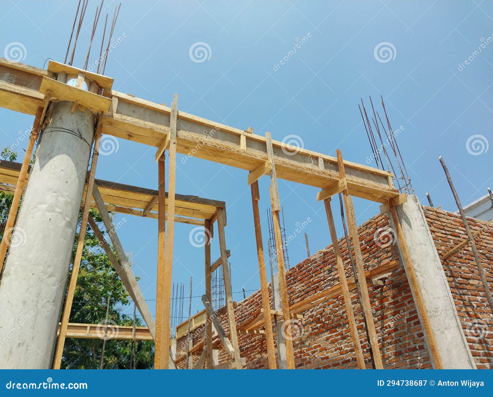 Building Under Construction. a Building Column Whose Formwork Has Just ...