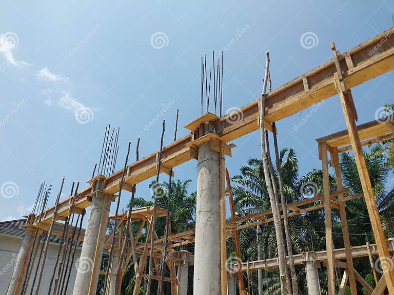 Building Under Construction. a Building Column Whose Formwork Has Just ...
