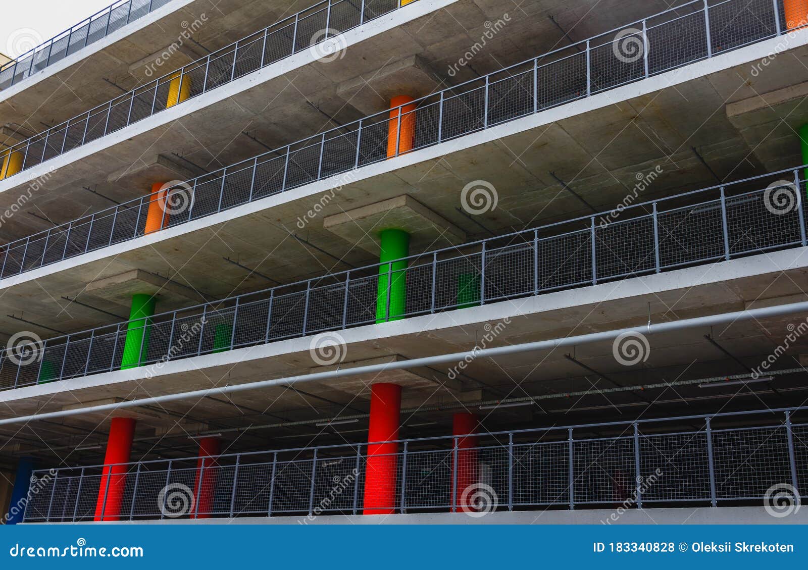 Building with Concrete Floors and Colored Support Columns Stock Photo ...