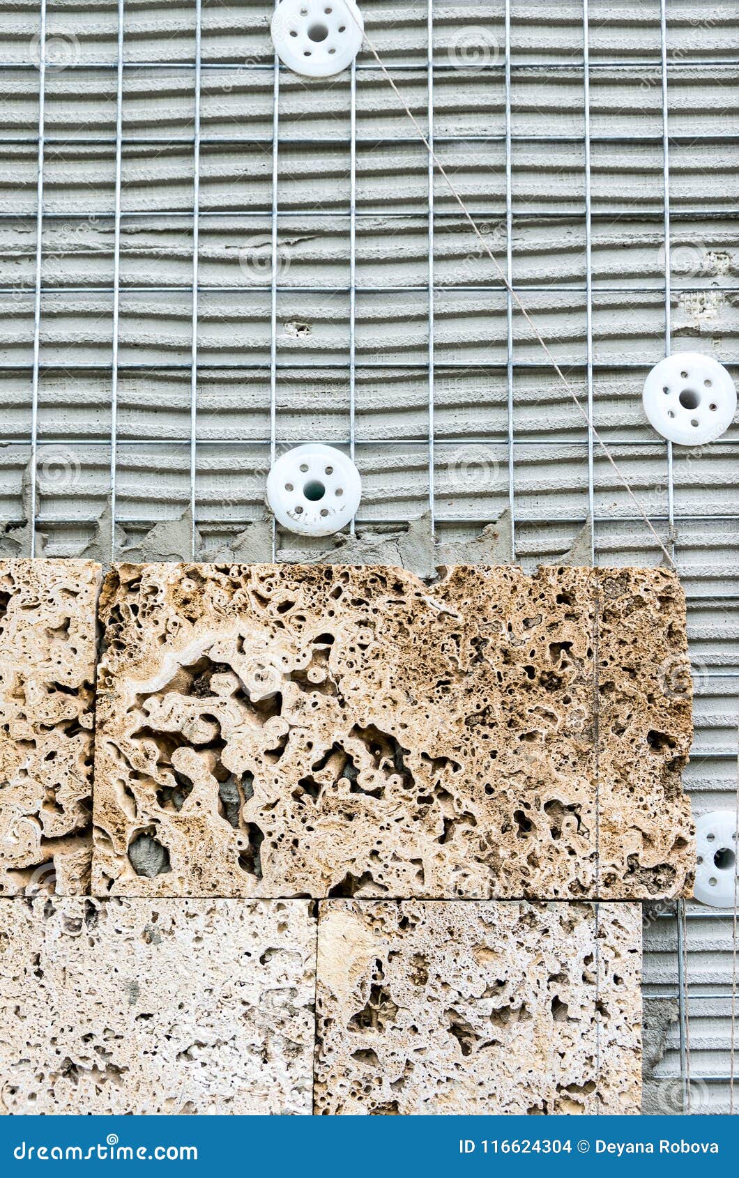 A Building Under Construction, Lined with Stone Slabs. Stock Photo ...