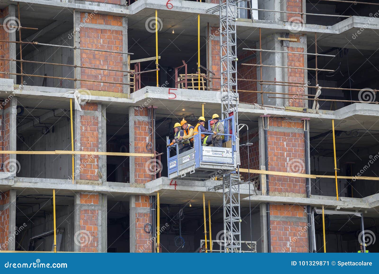 Building Construction Industrial Elevator with Workers Editorial Photo ...